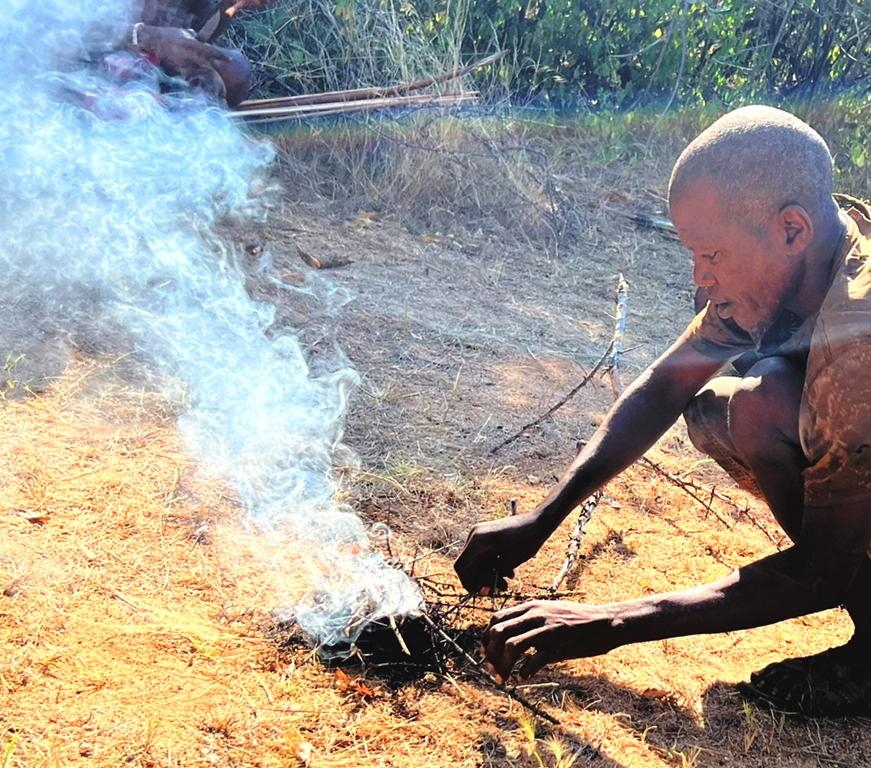 Hadza hand drill friction fire - Bushguide 101